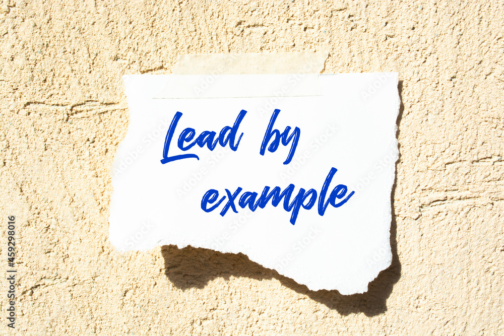 Text lead by example on the short note texture background Stock Photo ...