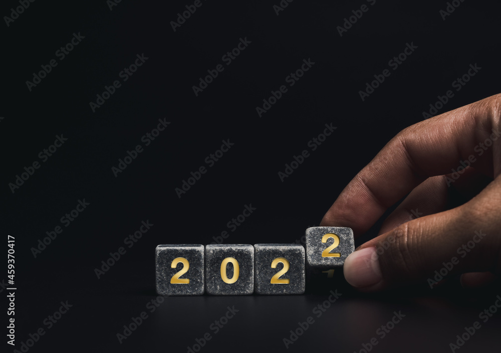The year 2021 change to 2022 with the successful concept. Close-up hand ...