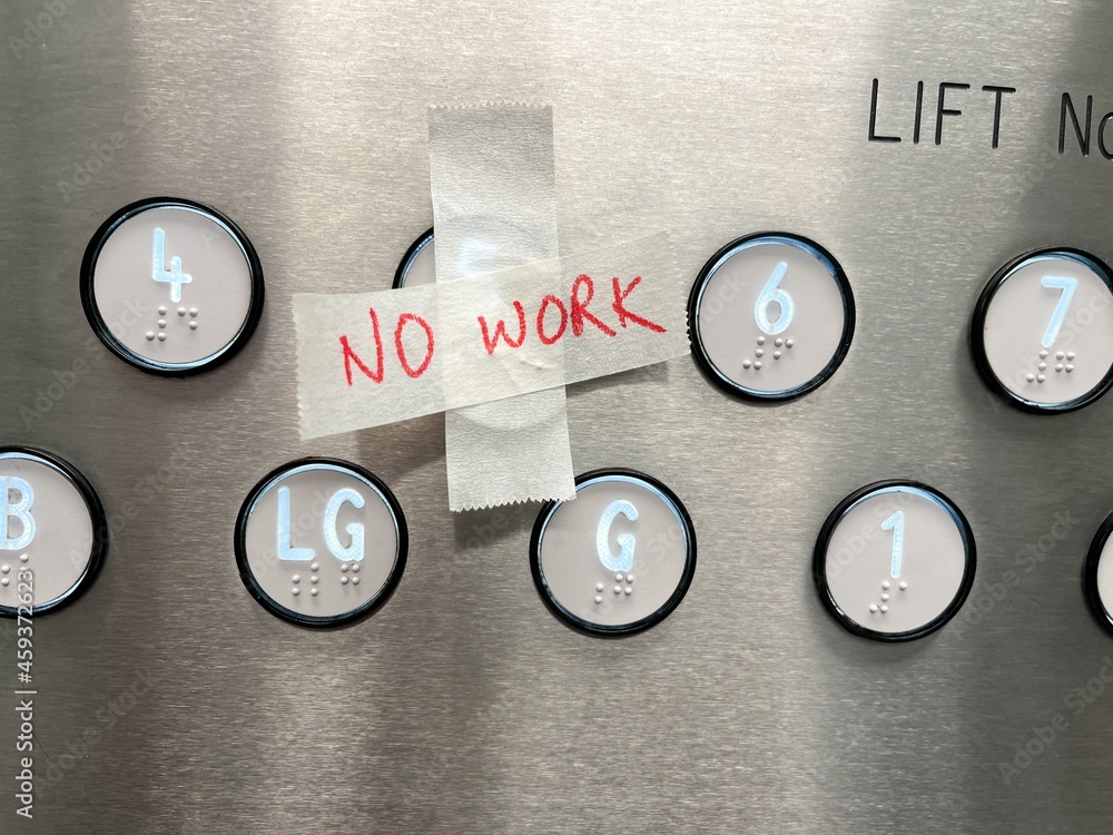 A no work sign on the buttons of an out of service lift elevator Stock ...