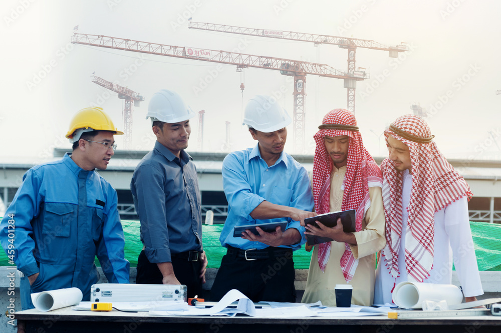 Multiethnic group of young business man and engineer man collaboration ...