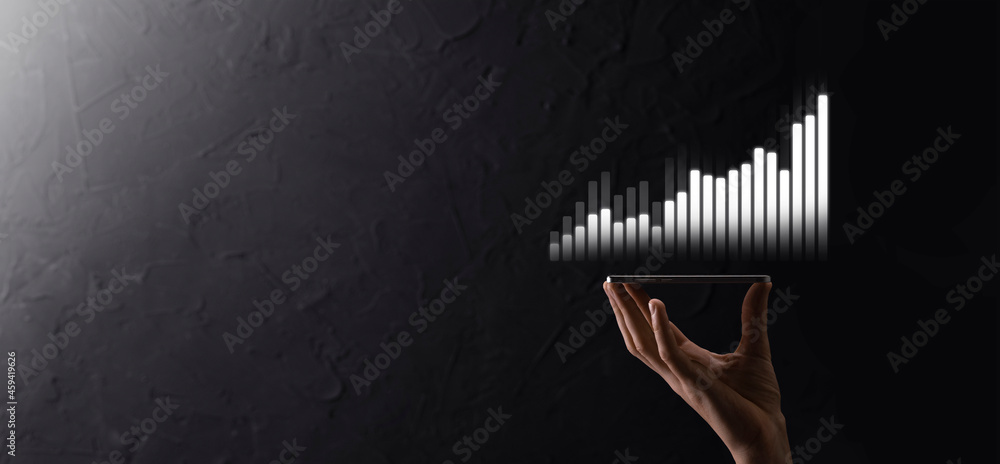 Businessman holding graph growth and increase of chart positive ...