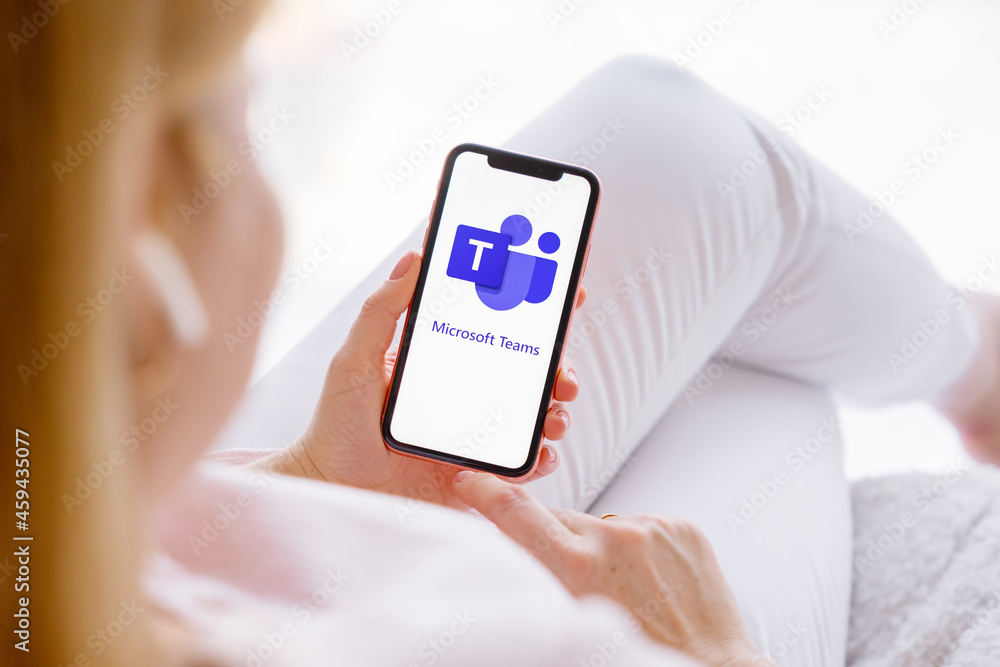 Riga, Latvia - March 26, 2021: Woman holding mobile phone with ...