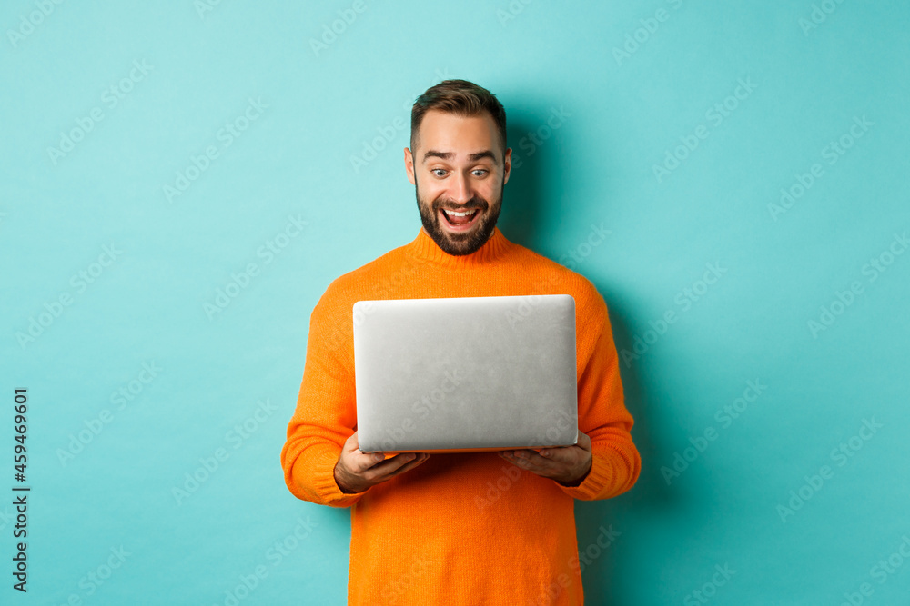 Excited Person On Computer