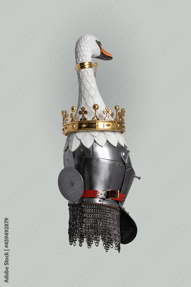 Medieval knightly Milanese helmet with a heraldic kleinod in the form ...