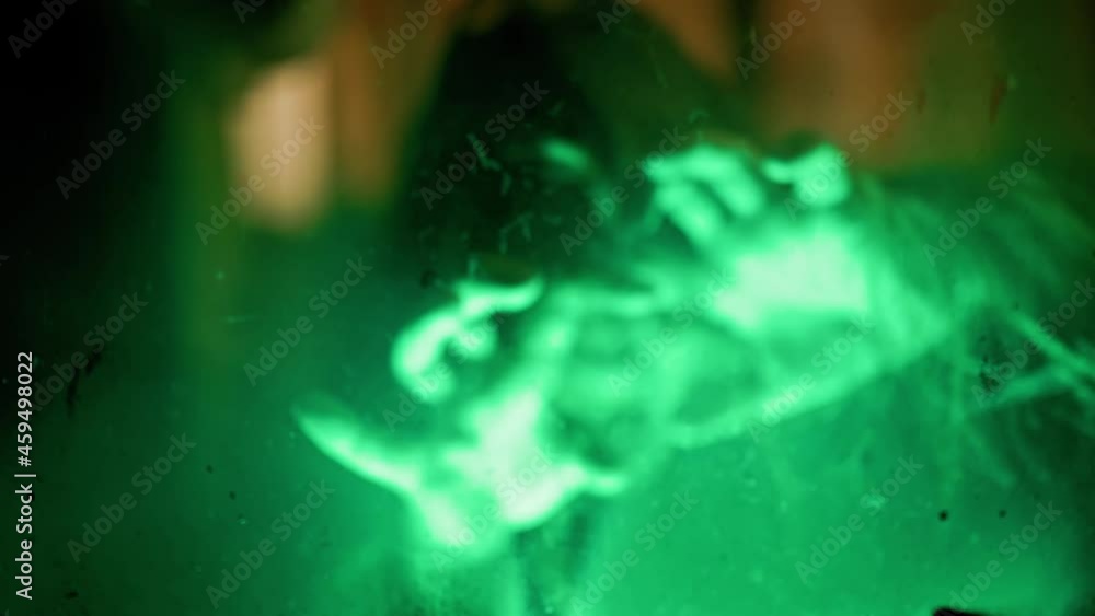 Scary ghost woman screaming through dirty glass on dark background ...