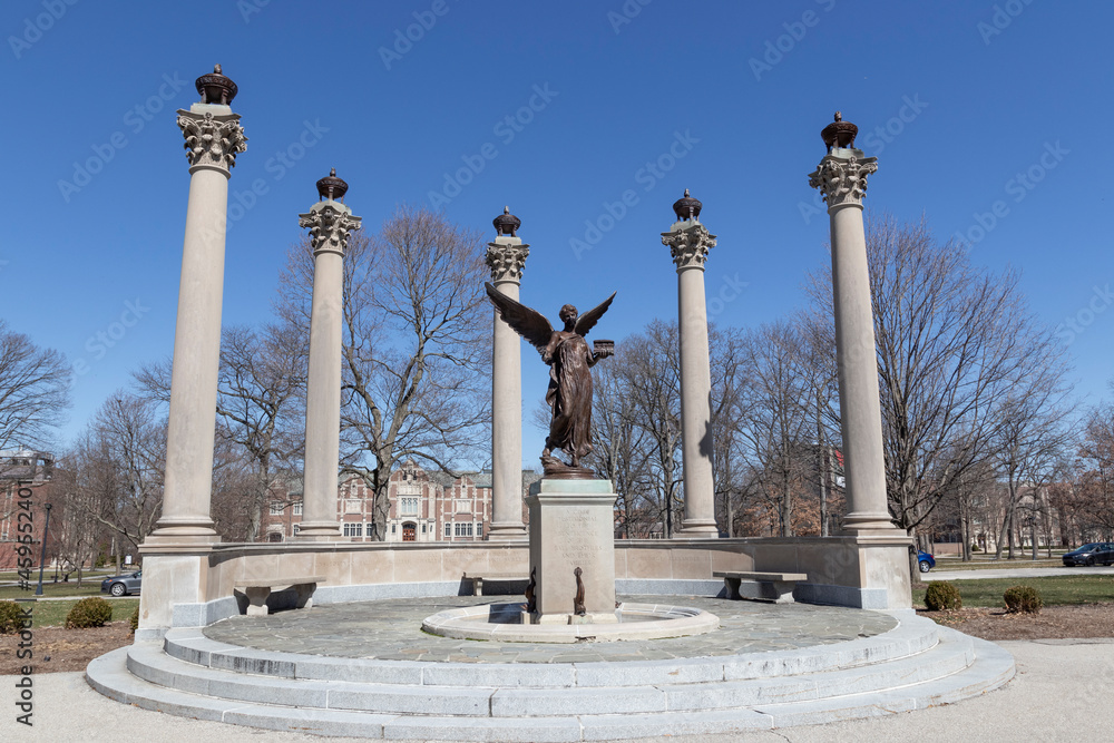 Beneficence statue on the campus of Ball State University. The five ...