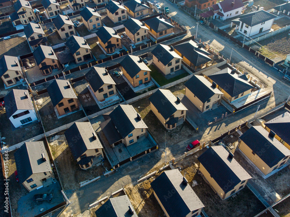 Urban scene across built up area showing the slate roof tops of houses ...
