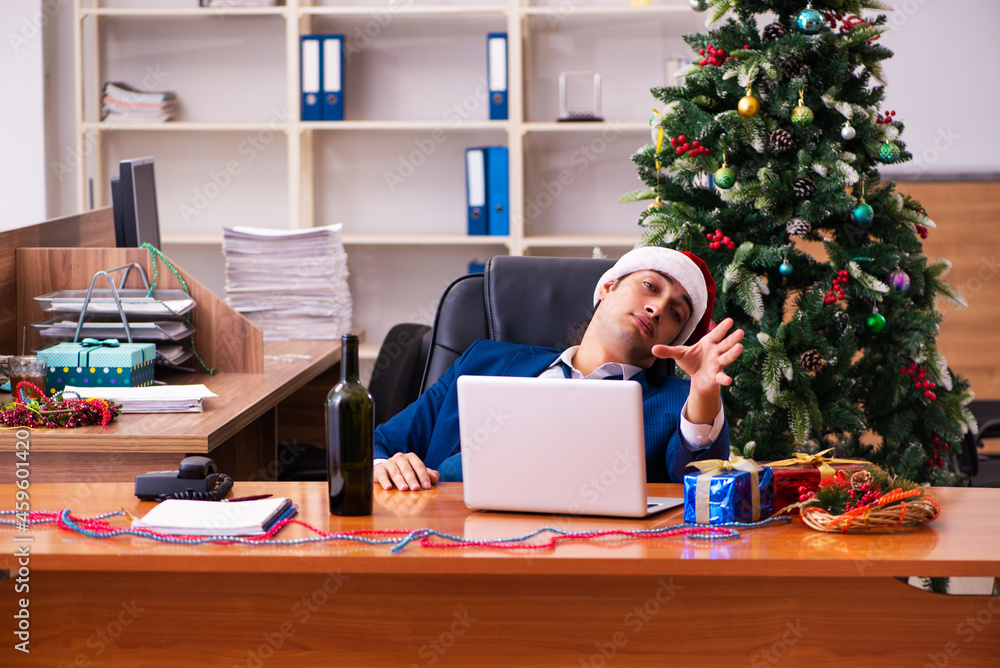 Employee in the office during christmas party Stock Photo | Adobe Stock