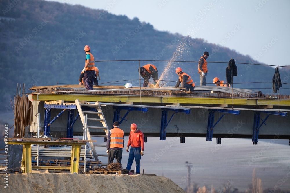 Working at height equipment. Worker as in construction background Stock ...