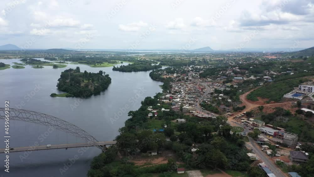 Stockvideon Aerial Adome bridge traffic Volta river pull back. Main ...
