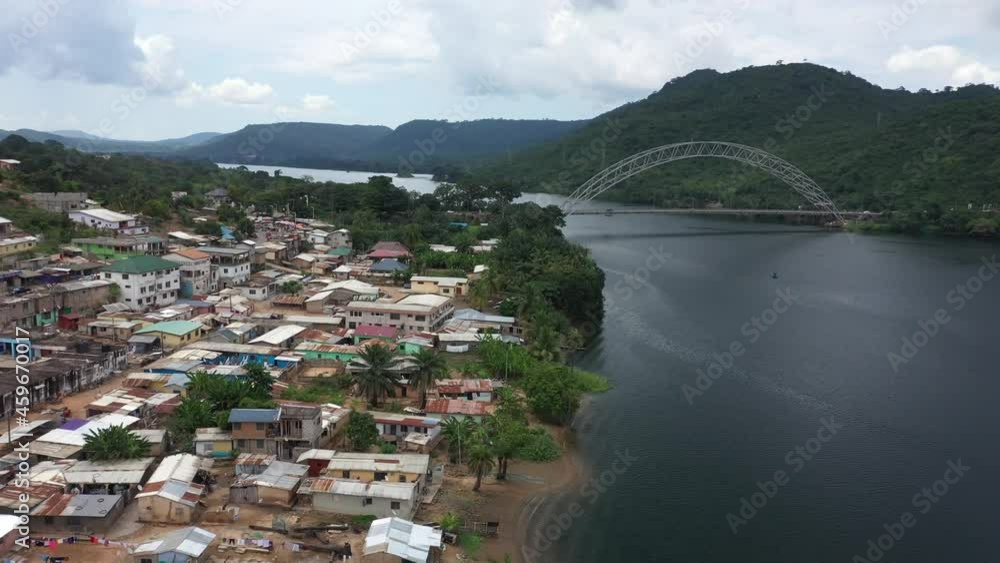 Aerial Adome bridge village homes Volta river Ghana 2. Main river ...