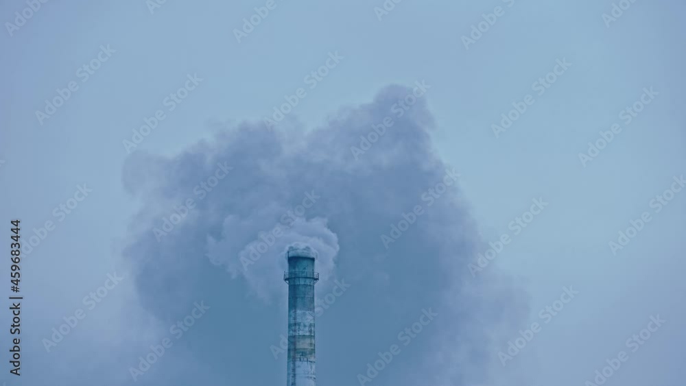 This smoke coming from the chimney in a factory. Harmful emissions into ...