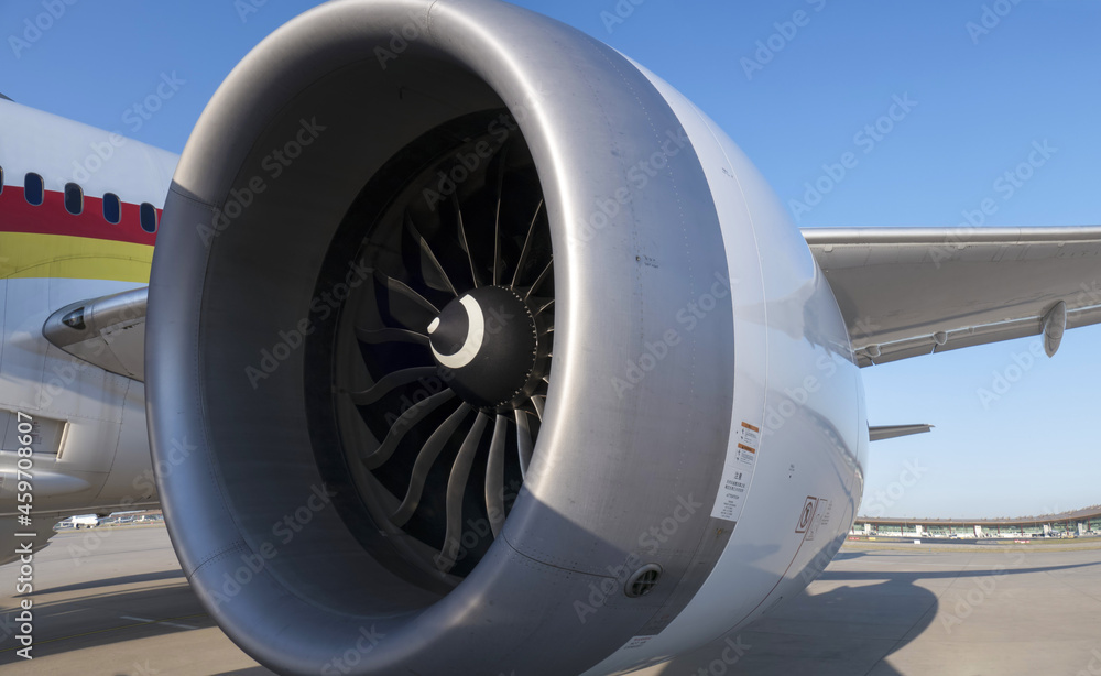 aircraft engine on the wing of the aircraft. Stock Photo | Adobe Stock