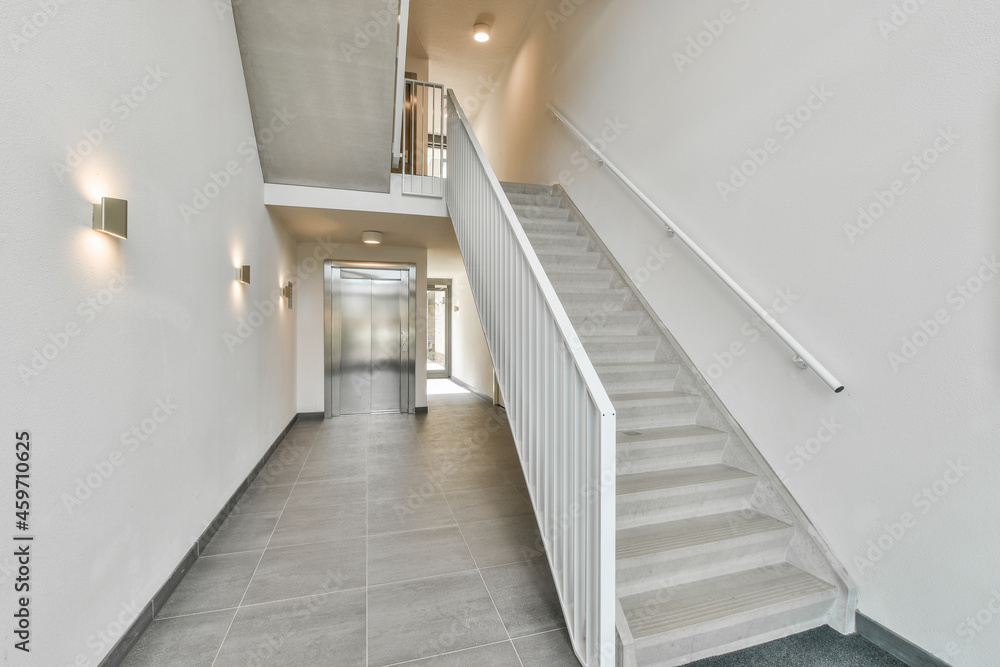 Interior of hall with stairs and elevator Stock Photo | Adobe Stock