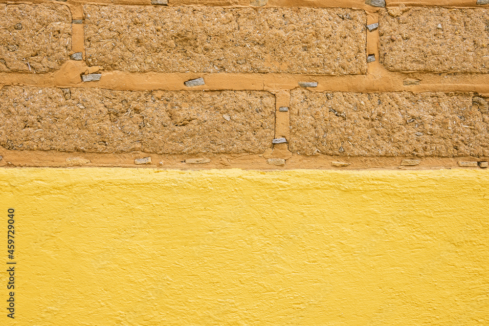 Detail of old adobe brick wall for background or texture. Mud brick ...