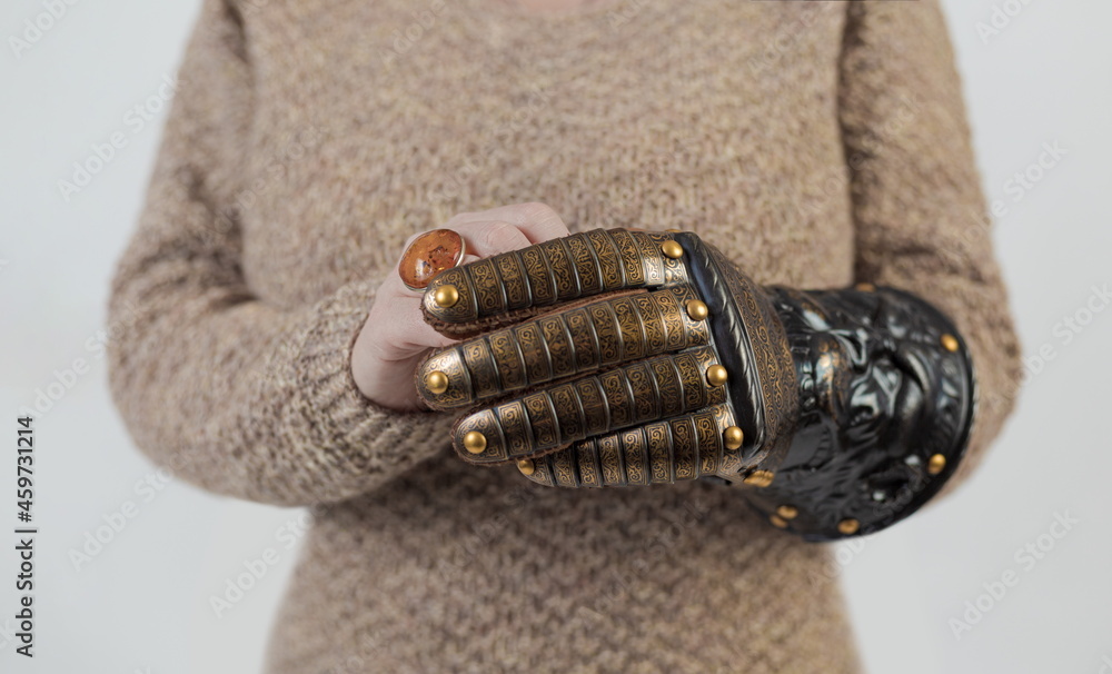 Medieval knightly brown plate gauntlet from Italian armor, in the form ...