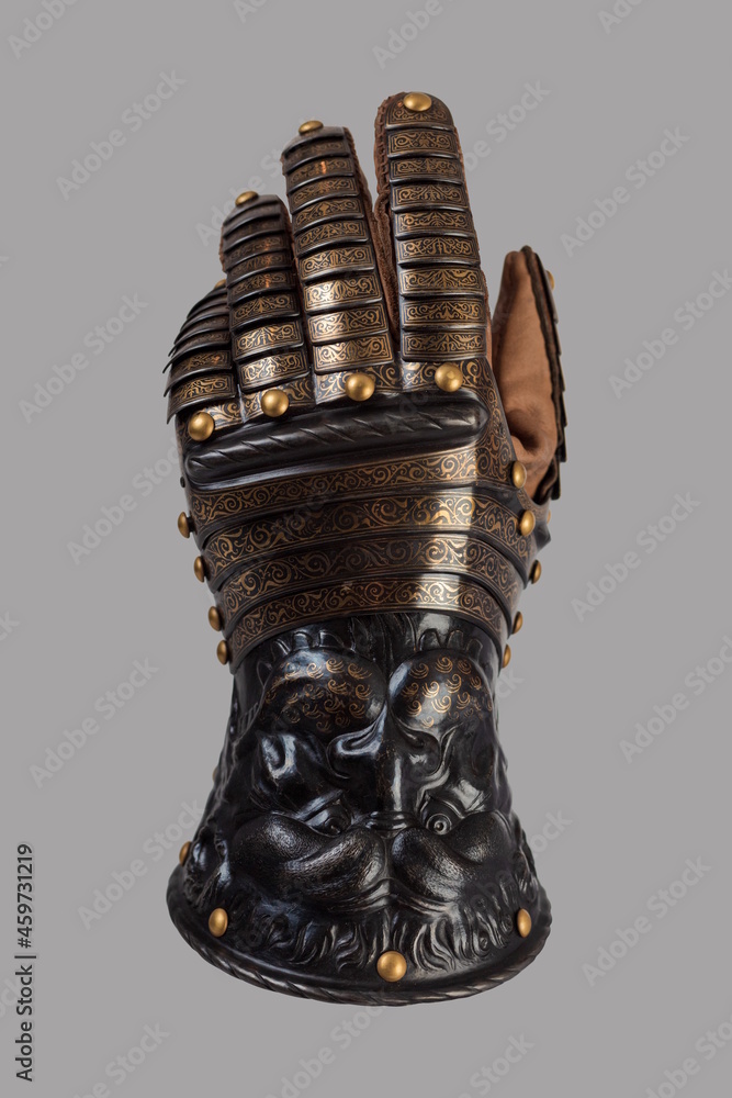 Medieval knightly brown plate gauntlet from Italian armor, in the form ...