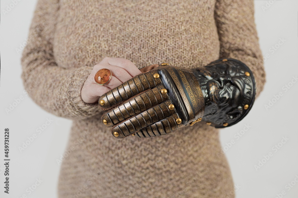 Medieval knightly brown plate gauntlet from Italian armor, in the form ...