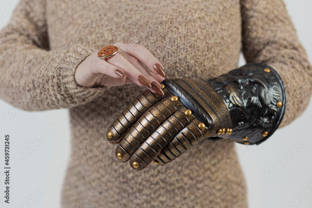 Medieval knightly brown plate gauntlet from Italian armor, in the form ...