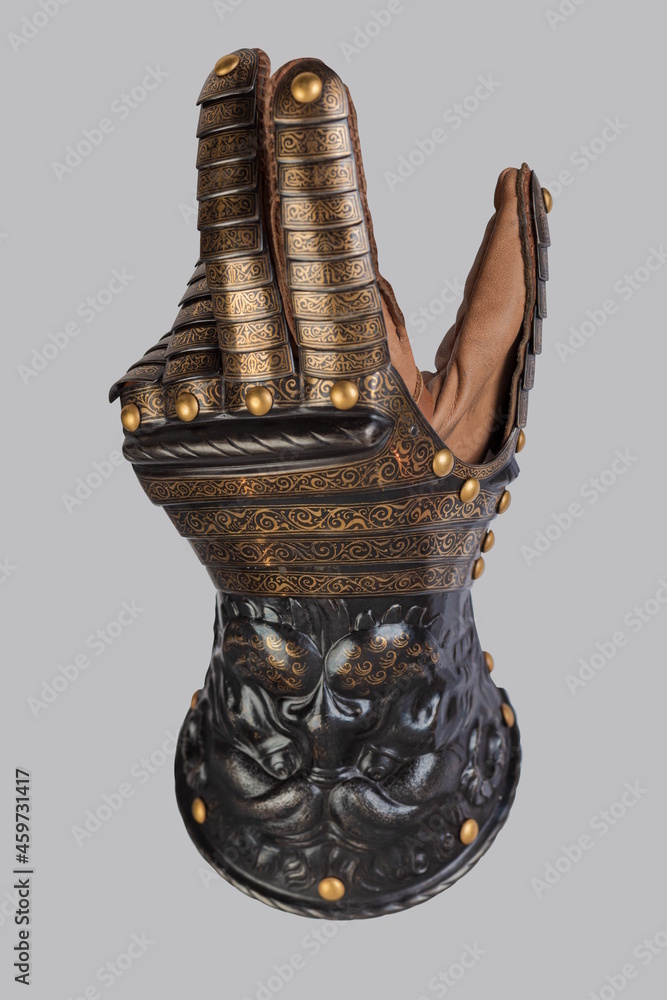 Medieval knightly brown plate gauntlet from Italian armor, in the form ...