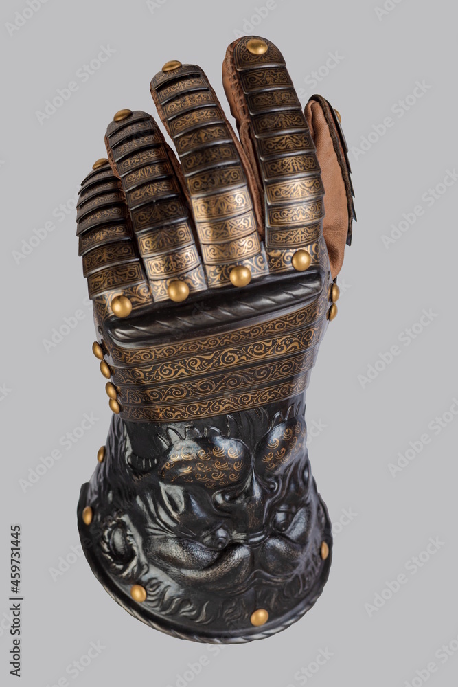 Medieval knightly brown plate gauntlet from Italian armor, in the form ...
