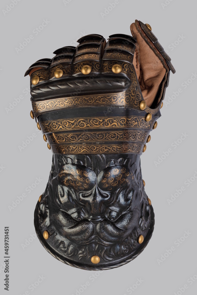 Medieval knightly brown plate gauntlet from Italian armor, in the form ...