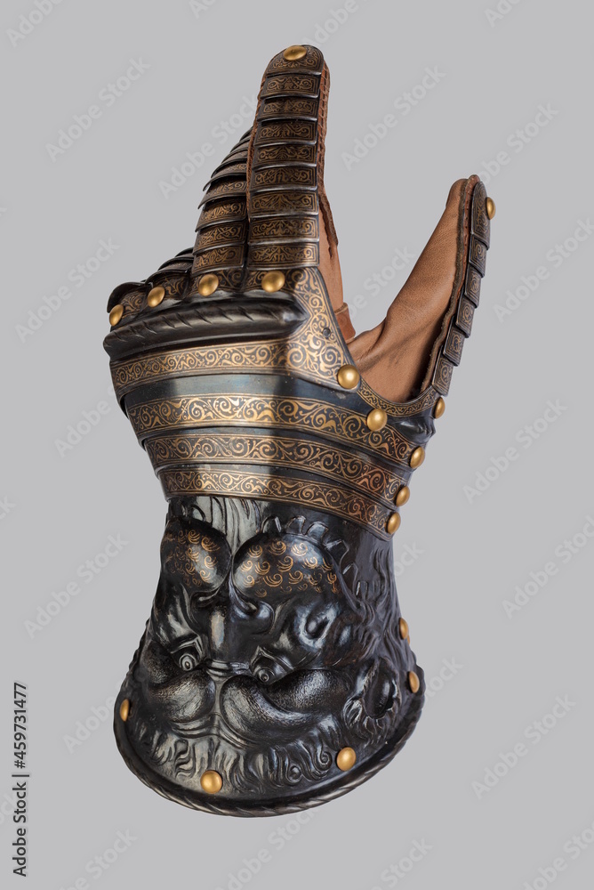 Medieval knightly brown plate gauntlet from Italian armor, in the form ...