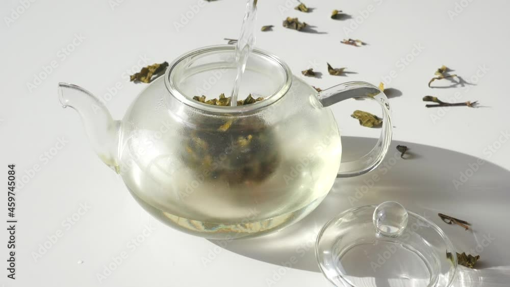 Video „Slow Motion of Process of Brewing Tea in Transparent Glass ...