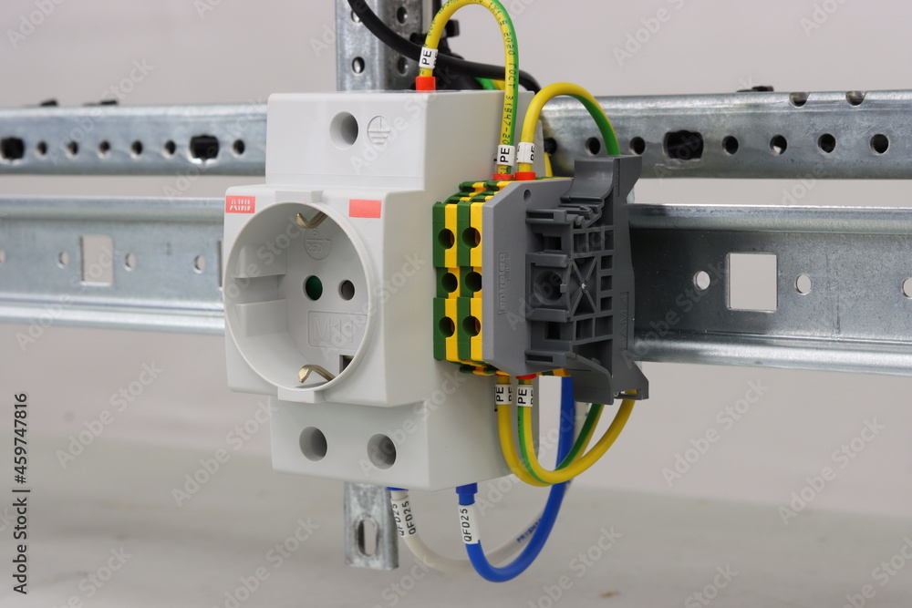 Electrical socket for installation on a din rail on electrical panel ...