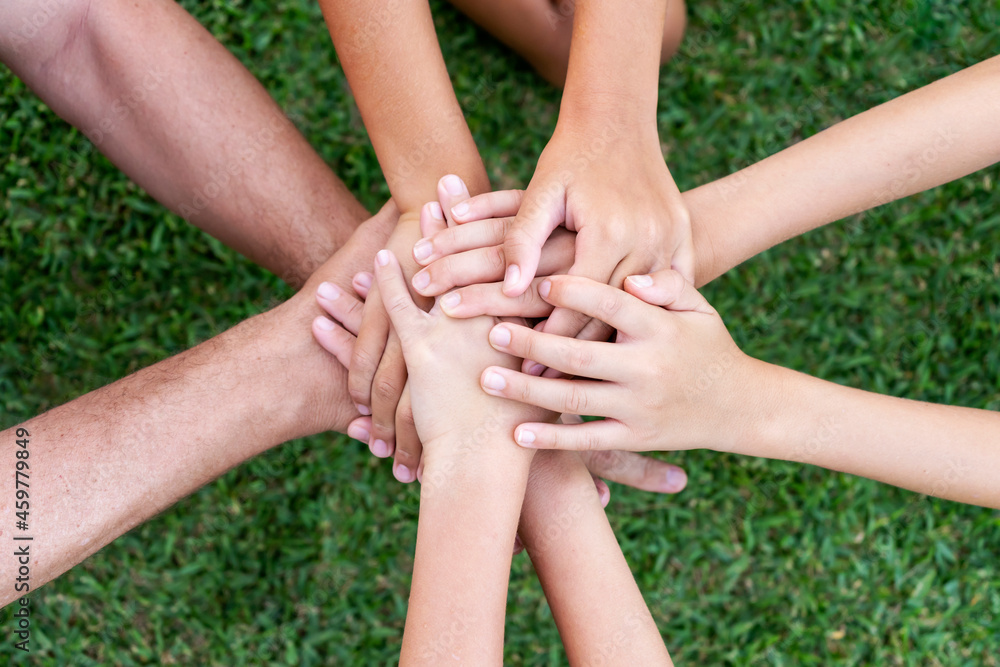 STACKED HANDS SHOWING UNITY AND STRENGH. TOP VIEW. Stock Photo | Adobe ...