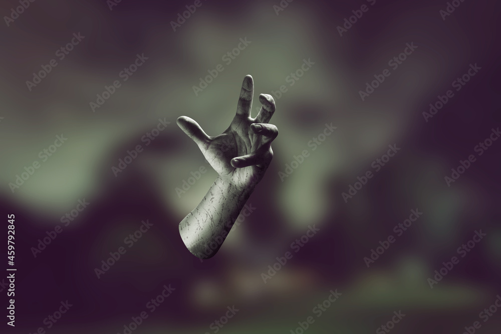 Creepy severed human hand in an eerie setting on blurred scary ...