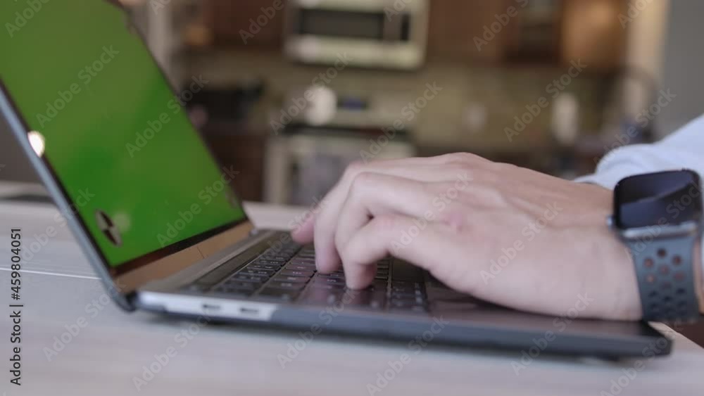 Hands Typing In Laptop With Green Screen, Pan Camera. Male hands typing ...
