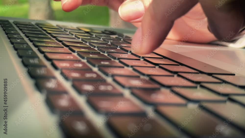 Woman fingers type text on the keyboard, close-up. Touch typing with ...