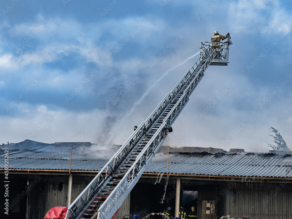 Boom crane with firefighters. Fragment fire truck with retractable ...