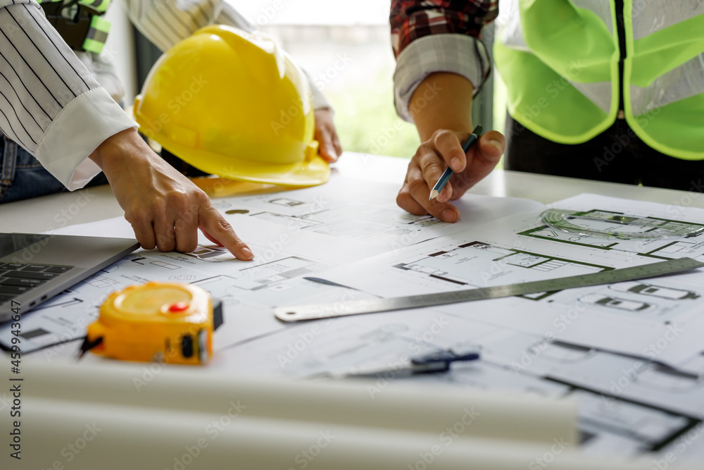 Architect design engineer working drawing sketch plans blueprints and ...