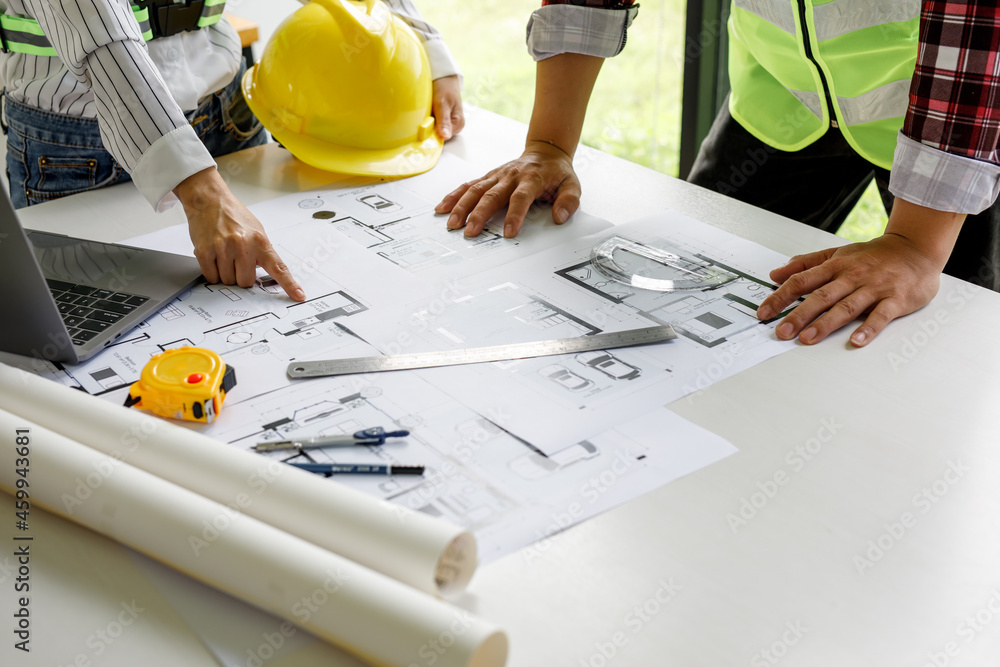 Architect design engineer working drawing sketch plans blueprints and ...