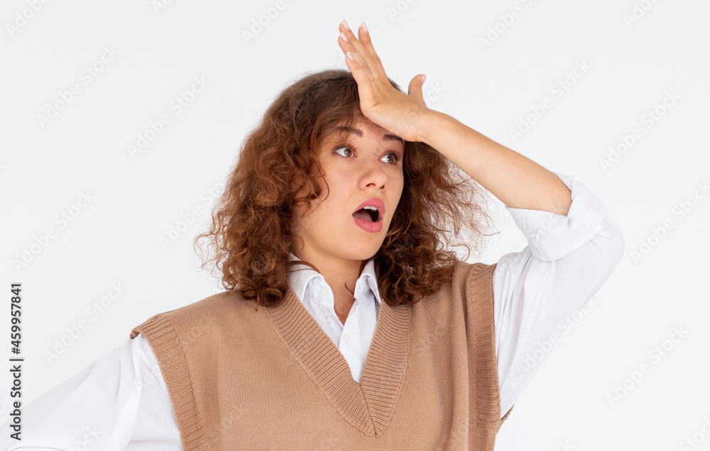 Closeup portrait silly woman, slapping hand on head having duh moment ...