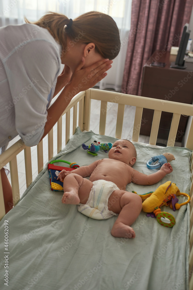 Lovely mother and baby boy child playing peek-a-boo Stock Photo | Adobe ...