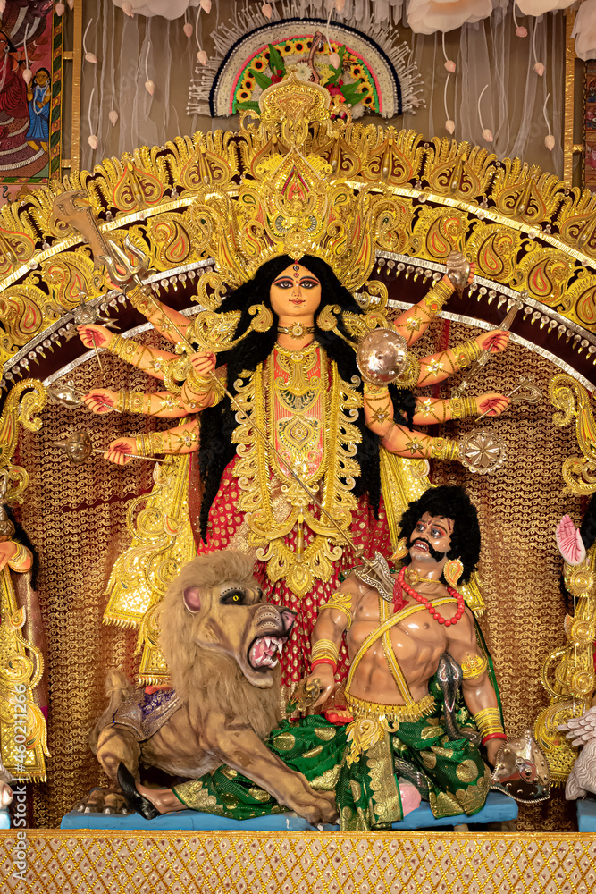 Idol of Goddess Devi Durga at a decorated puja pandal in Kolkata, West ...