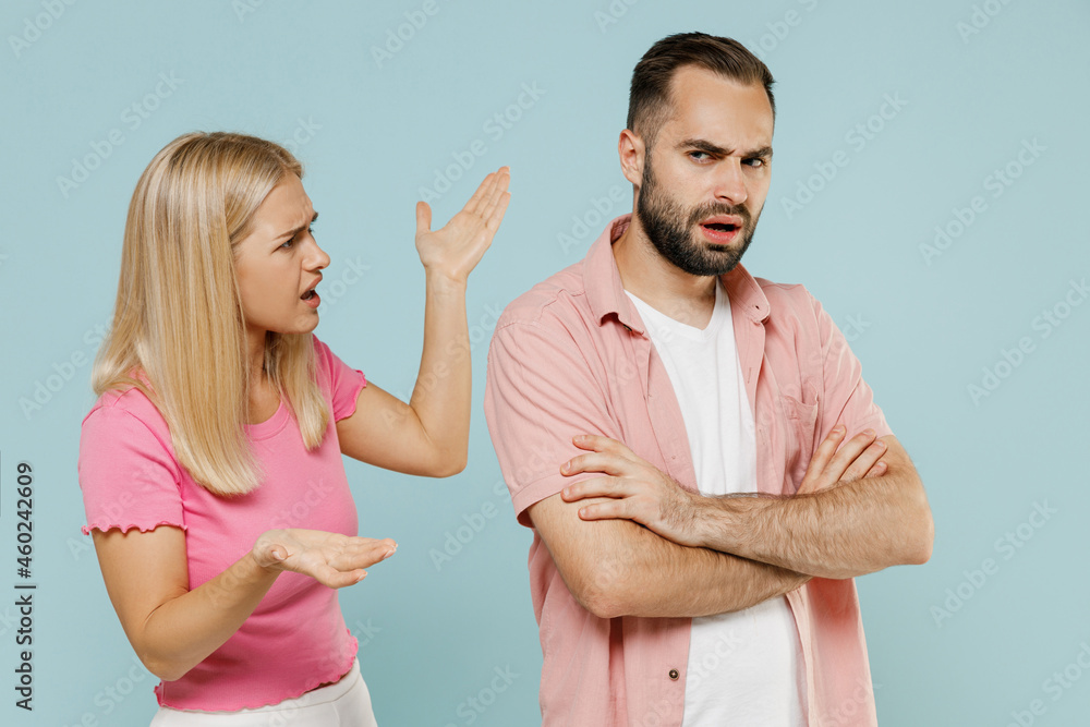 Young displeased sad couple two friends family man woman in casual ...