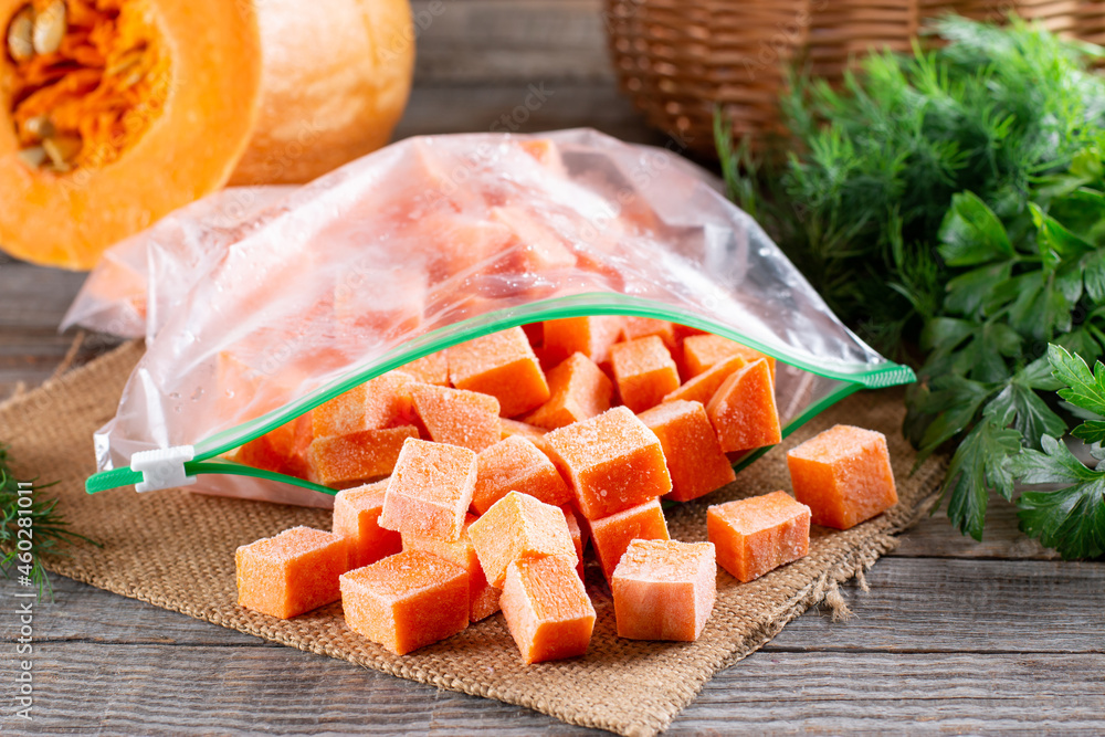 Frozen diced pumpkin. Food background of freshly frozen diced pumpkin ...