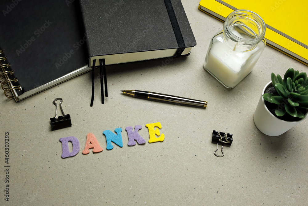 danke (thank you in german language) word made with felt letters on ...