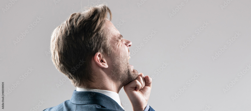 Professional man employee got punch in face with fist grey background ...