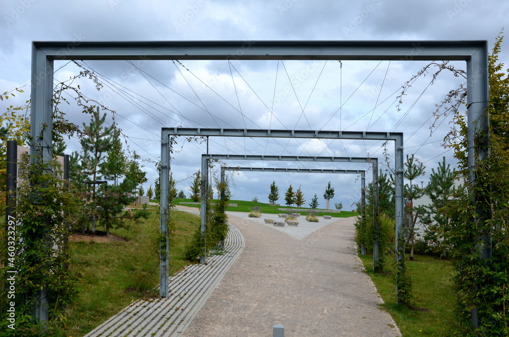 the entrance to the park is enhanced by metal trellises from galvanized ...