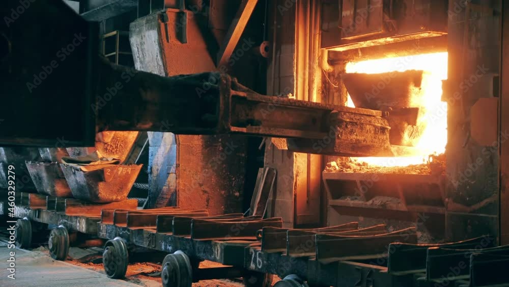 Reservoirs are getting submerged into a mining furnace Stock ビデオ ...