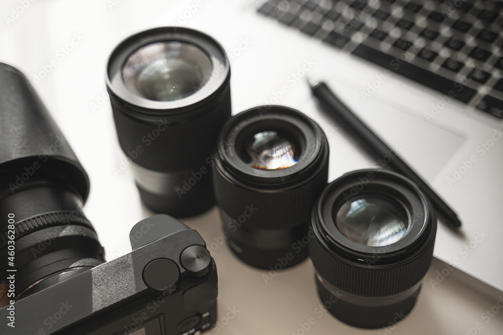 Workplace with a modern equipment for photography. Mirrorless camera ...
