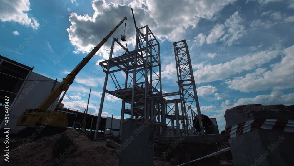 At construction site where a new, modern plant is being built, a lot of ...