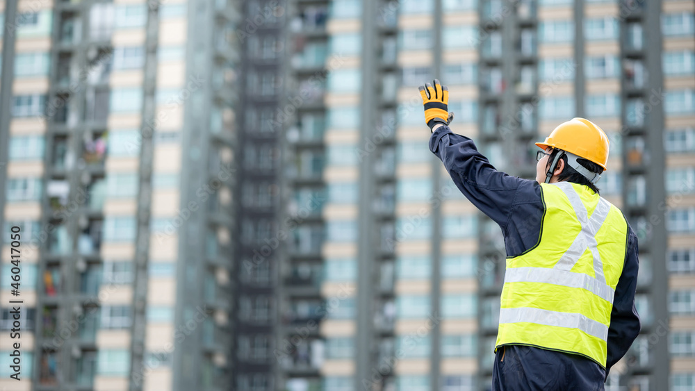 Asian maintenance worker man with safety helmet and reflective suit ...