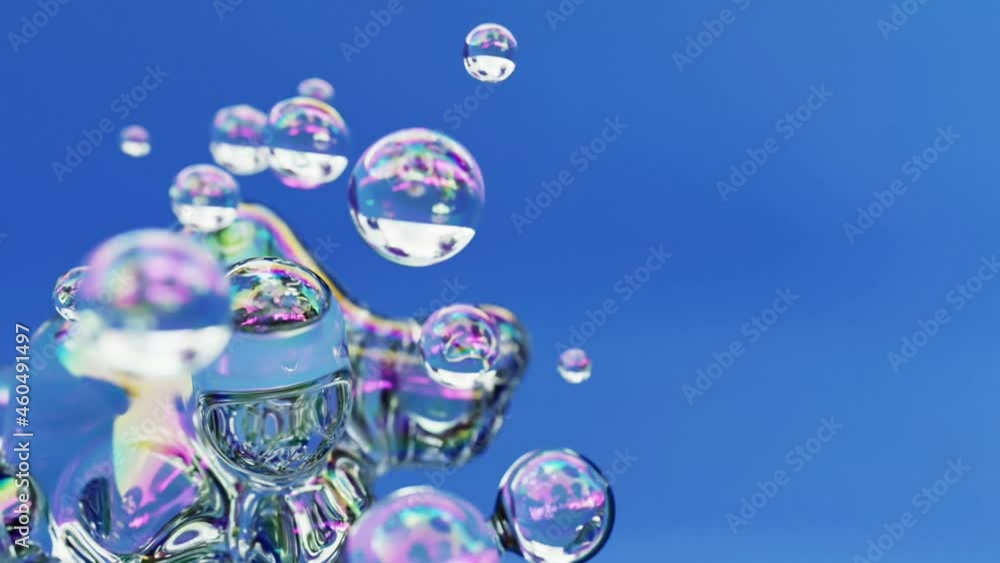Liquid iridescent transparent clean soapy animated metaball or organic floating spheres blobes ...