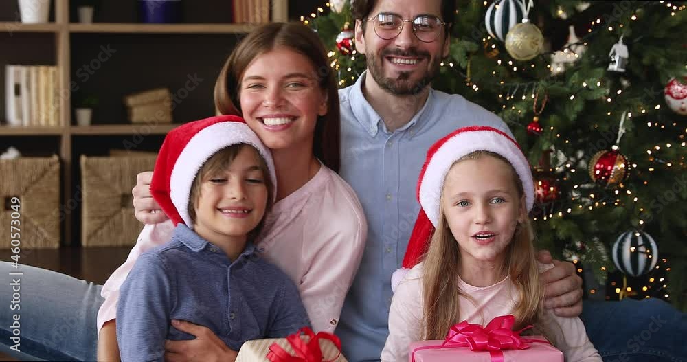 Friendly family video bloggers influencers wave hands to subscribers ...